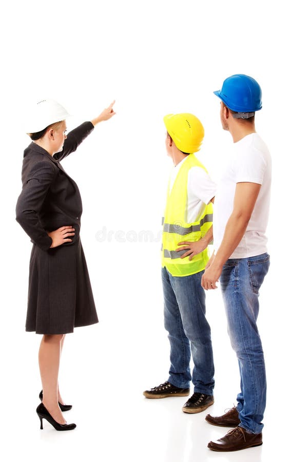 Female Engineer Talking with Two Builders Stock Photo - Image of ... Female Engineer Talking with Two Builders Stock Photo - Image of ...