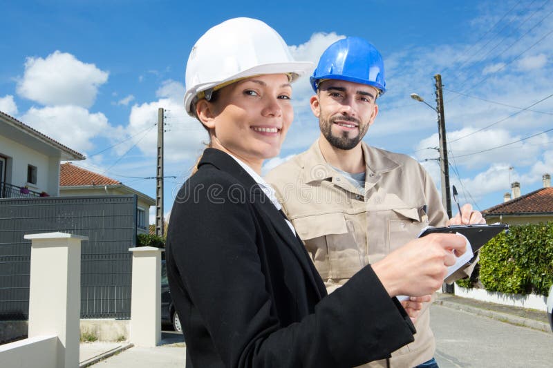 Female Engineer or Architect Checking Interior Building with ...