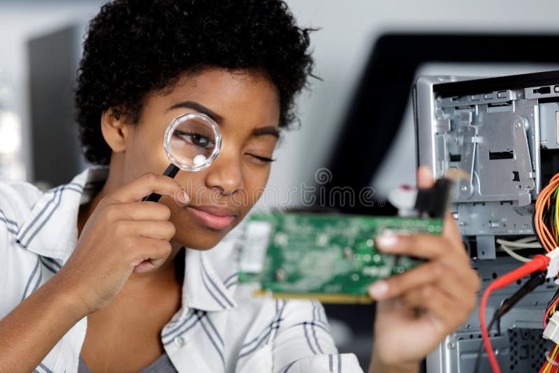 Female Engineer Uses Magnifying Glass Stock Photo - Image of chip ...