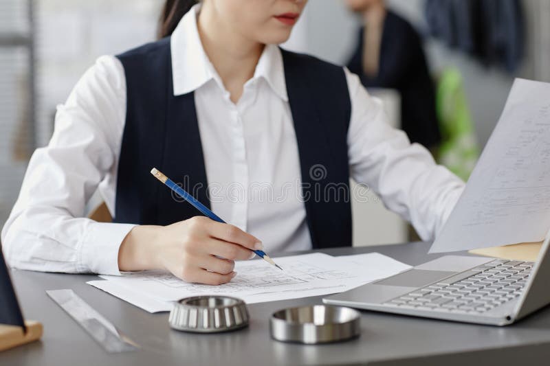 Female Engineer Using Computer at Workplace in Office and Designing ...