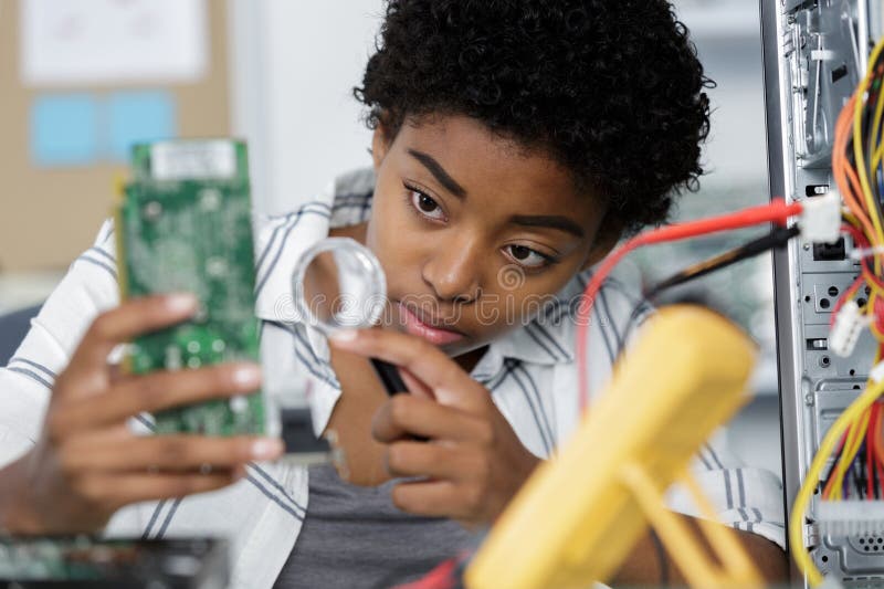 Female Engineer Working Working with Circuit Board Stock Photo - Image ...