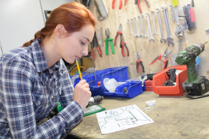 Female Engineer Working on Project Stock Photo - Image of helmet ...