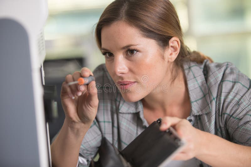 Female Engineer Working with Screwdriver Stock Image - Image of ...