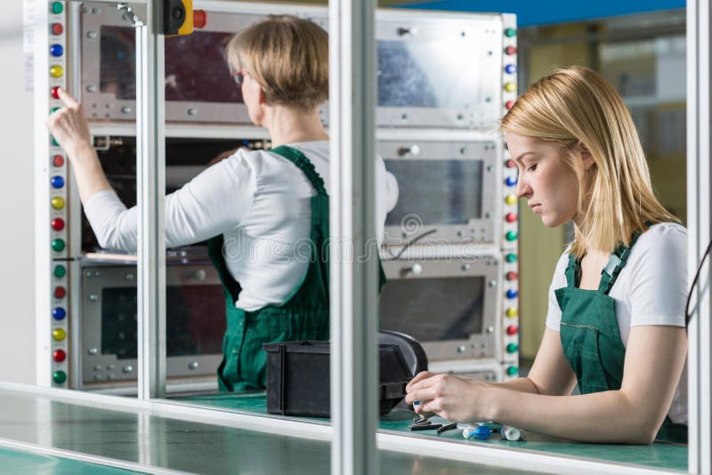 Female Assembly Line Workers Stock Photo - Image of female, indoor ...
