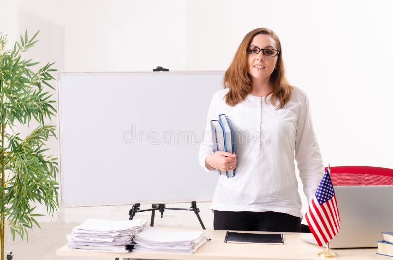 The Female English Teacher in the Classroom Stock Photo - Image of ...