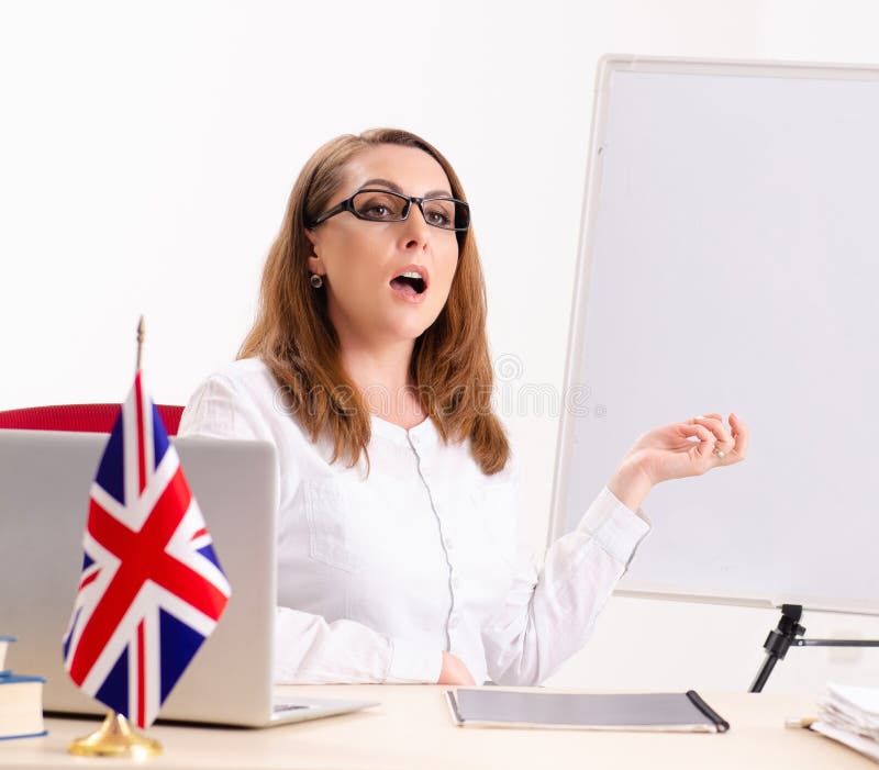 Female English Teacher in the Classroom Stock Photo - Image of lesson ...