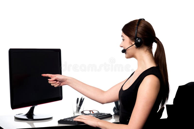Female Executive Pointing at Computer Screen Stock Photo - Image of ...