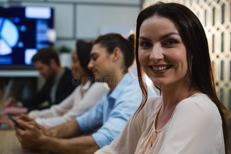 Female Executive Relaxing in Conference Room Stock Photo - Image of ...