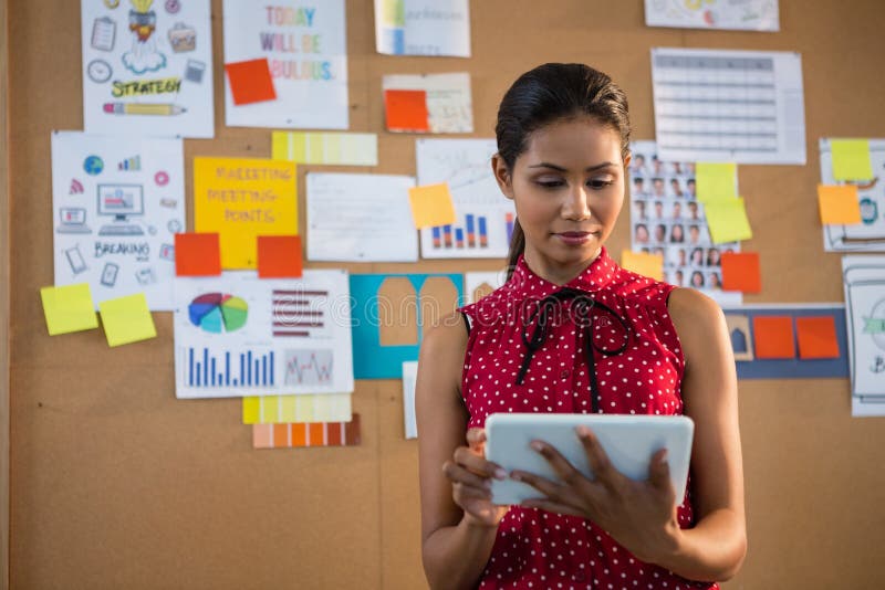 Female Executive Using Digital Tablet in Office Stock Photo - Image of ...