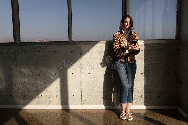 Female Executive Using Mobile Phone in Office Stock Photo - Image of ...