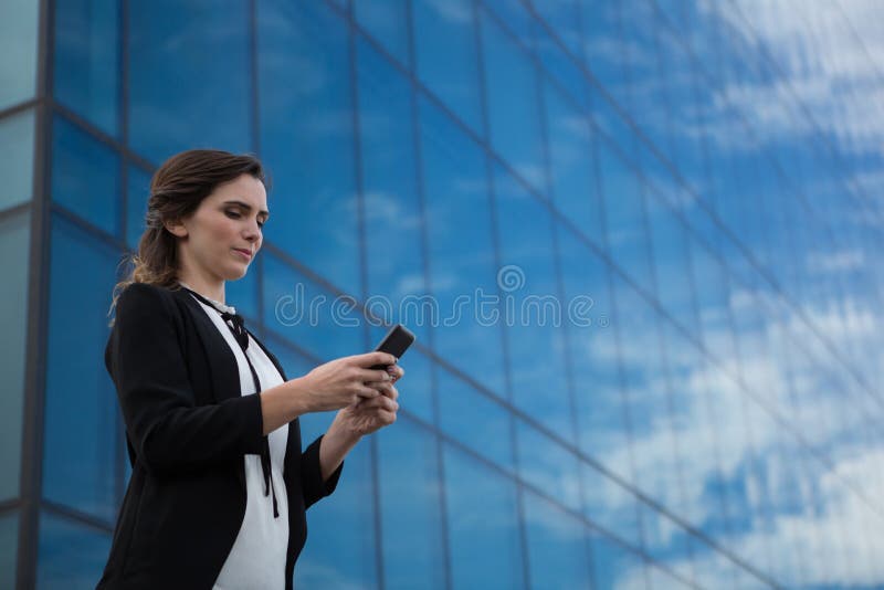 Female Executive Using Mobile Phone Stock Image - Image of office ...