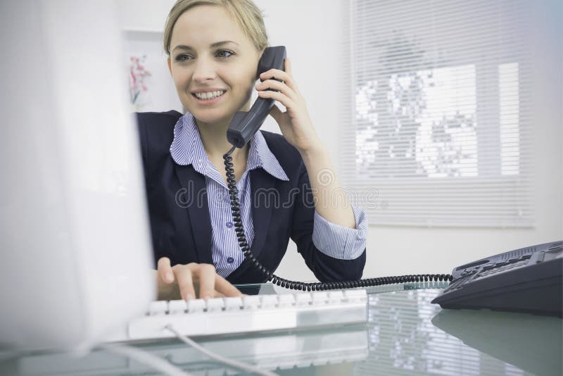 Female Executive Using Phone and Computer at Office Stock Illustration ...