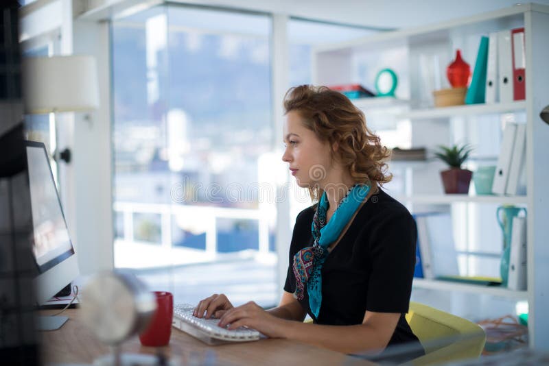 Female Executive Working on Computer Stock Image - Image of ...