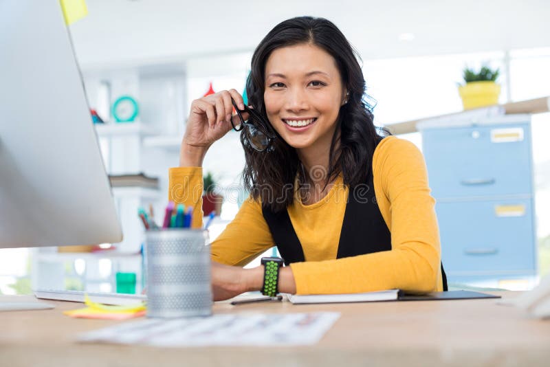 Female Executive Working at Desk in the Office Stock Image - Image of ...