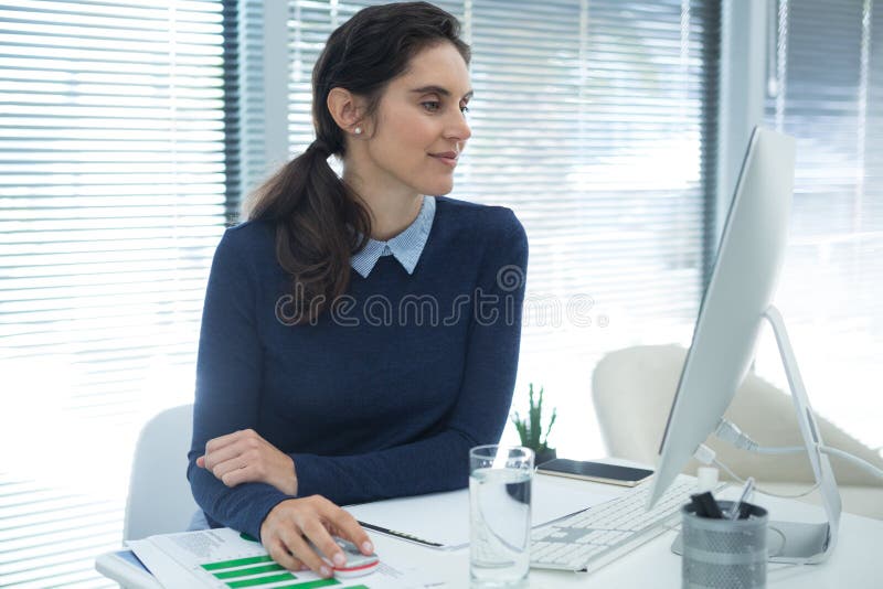 Female Executive Working on Desktop Pc at Desk Stock Photo - Image of ...