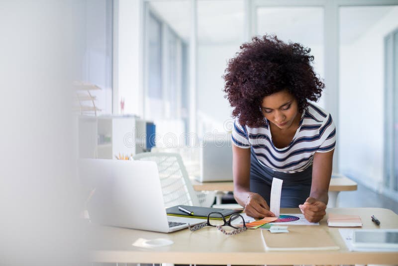 Female Executive Working at Her Desk Stock Photo - Image of drawing ...