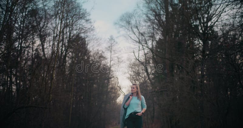 Female Explore with Hand in Pocket at Forest Stock Video - Video of ...