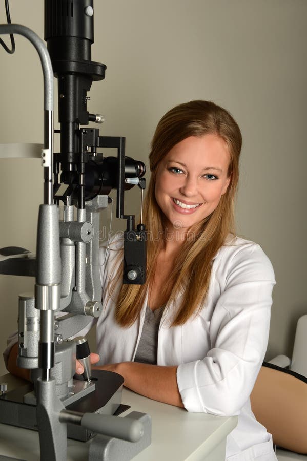 Female Eye Doctor in Examination Room Stock Image - Image of ...