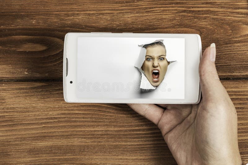 Female Face through the Hole in Paper Stock Photo - Image of studio ...