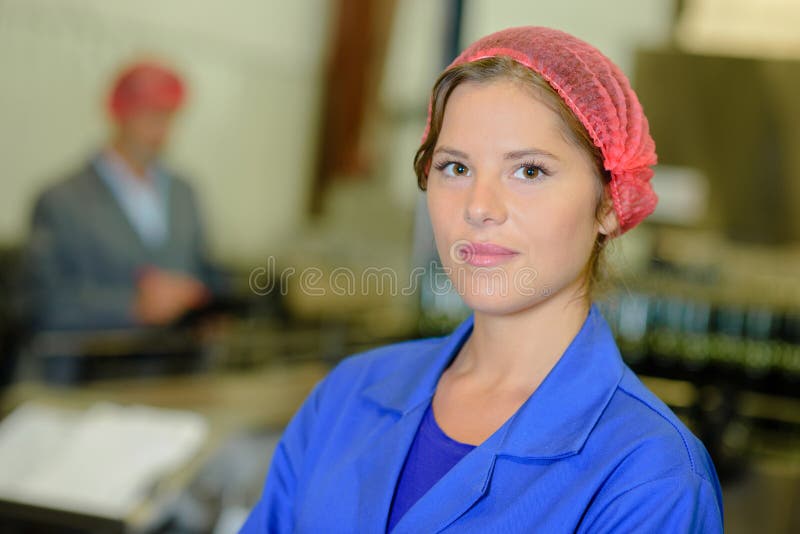Female factory worker stock photo. Image of blurry, factory - 173081236