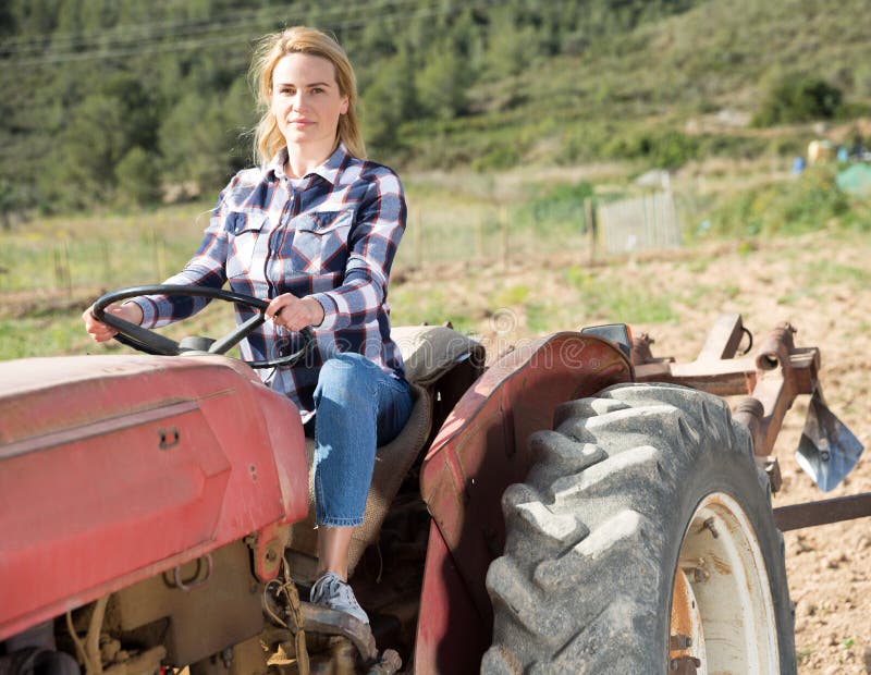 Female Farmer Working on Farm Tractor Stock Image - Image of girl ...