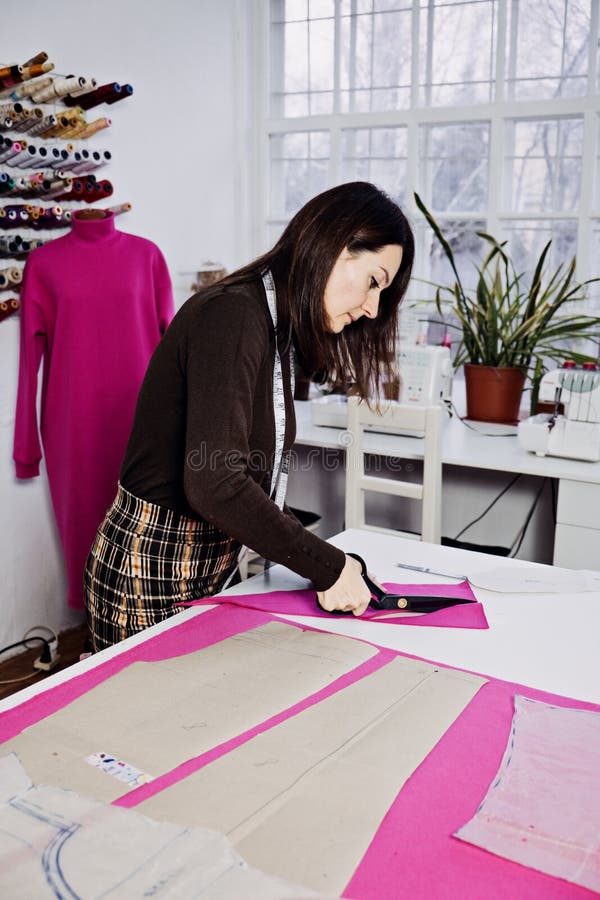 Female Fashion Designer Tailor Making Sewing Patterns at Workplace in ...