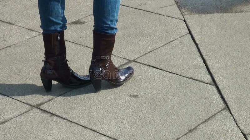 Female feet in boots stock footage. Video of footgear - 89293060
