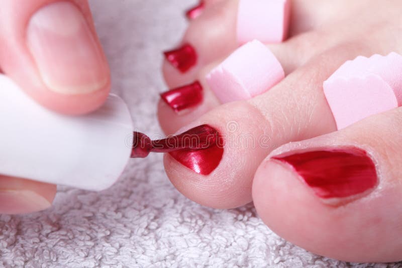 Female Feet Red Polished Nails Stock Photo - Image of fashion, enamel ...