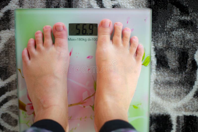 Female Feet that Step on the Floor Scale. Stock Photo - Image of ...