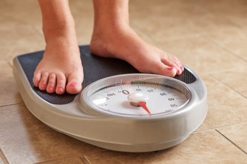 Female Feet on Weight Scale Stock Image - Image of legs, background ...