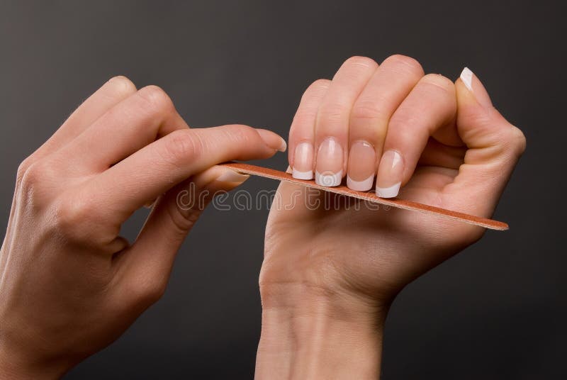 Female filing nails stock image. Image of filing, cosmetics - 10044087