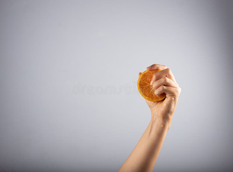 Female Fingers in the Juicy Pulp of an Orange Stock Photo - Image of ...