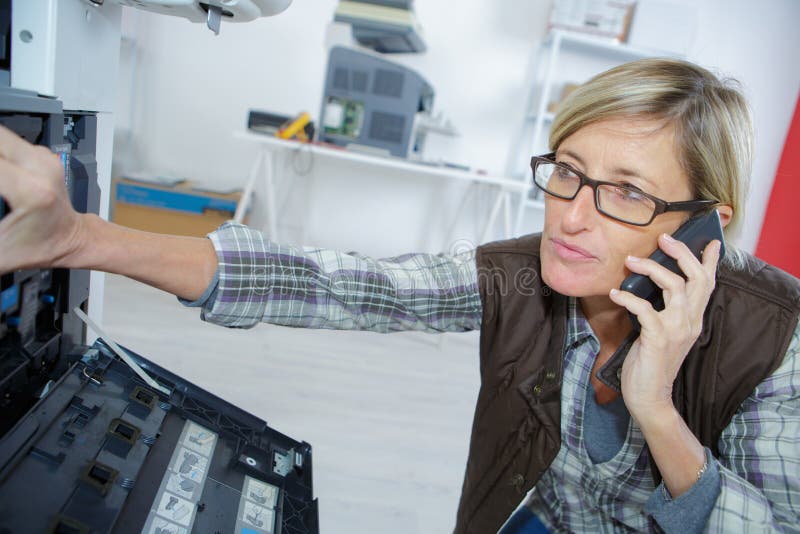Female Fixing Digital Device Stock Photo - Image of standing, computer ...