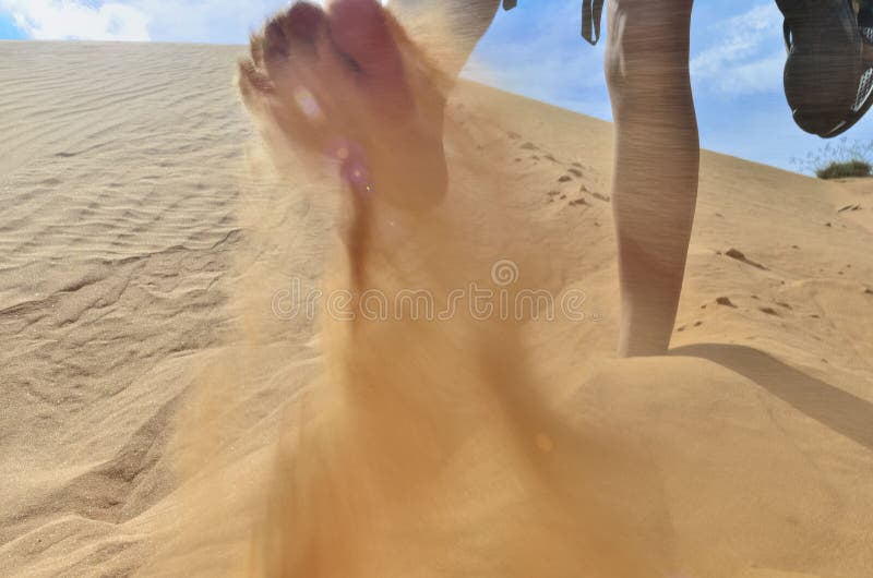 Female foot digs sand stock image. Image of barren, adult - 112666803