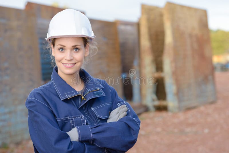 Female Foreman Posing Next To Construction Site Stock Image - Image of ...