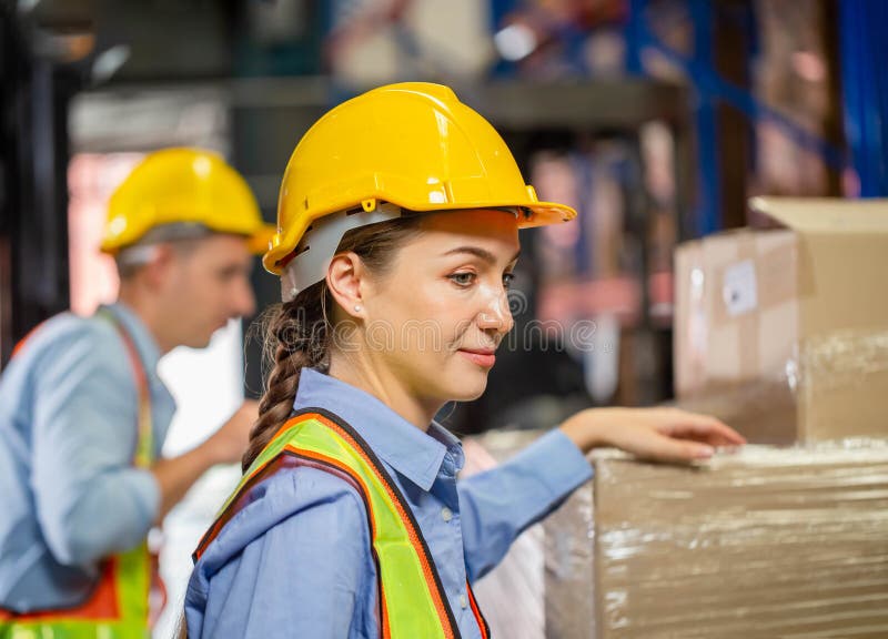 Female Foreperson Making Plans with Warehousemen, Manager and ...