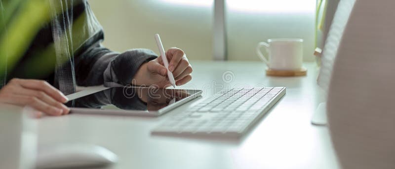 Female Freelancer Working with Digital Tablet on White Office Desk with ...