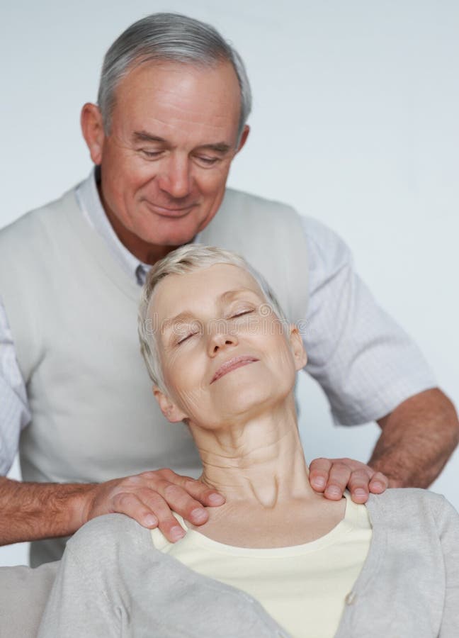 Female Getting a Shoulder Massage from Her Husband Stock Image - Image ...