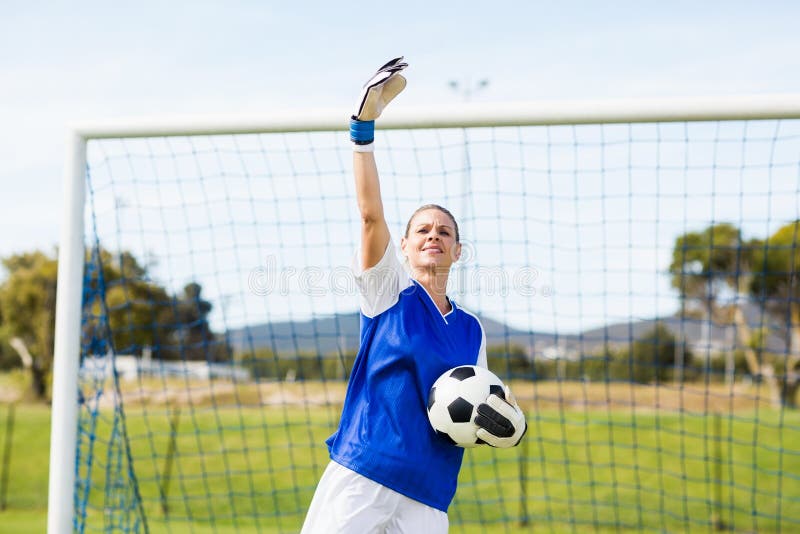 Female Goalkeeper Ball in His Hands, Standing at Football Goal Stock ...