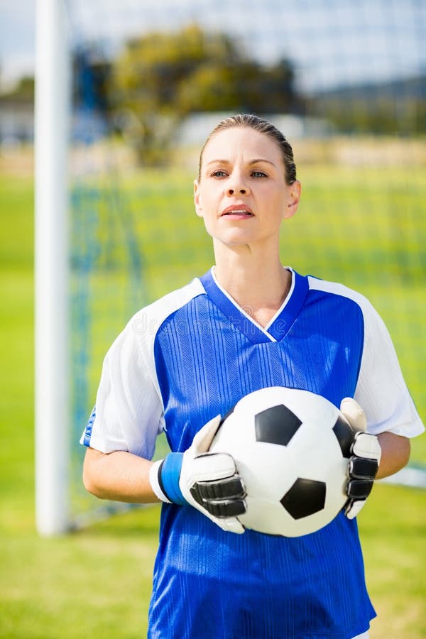 Goalkeeper Standing with Ball Stock Photo - Image of adult, graphic ...