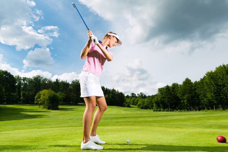 Female Golf Player on Course Doing Golf Swing Stock Image - Image of ...