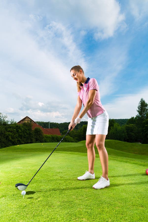 Female Golf Player on Course Doing Golf Swing Stock Image - Image of ...