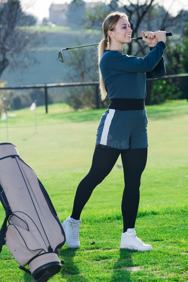 Female Golfer at Golf Course Stock Photo - Image of person, clubs: 87904570