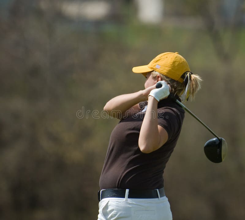 Female golfer side view stock photo. Image of sports - 13121308