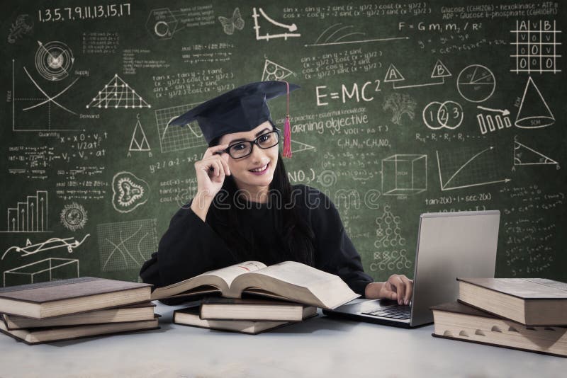 Female Graduate Learning with Laptop Stock Photo - Image of classroom ...