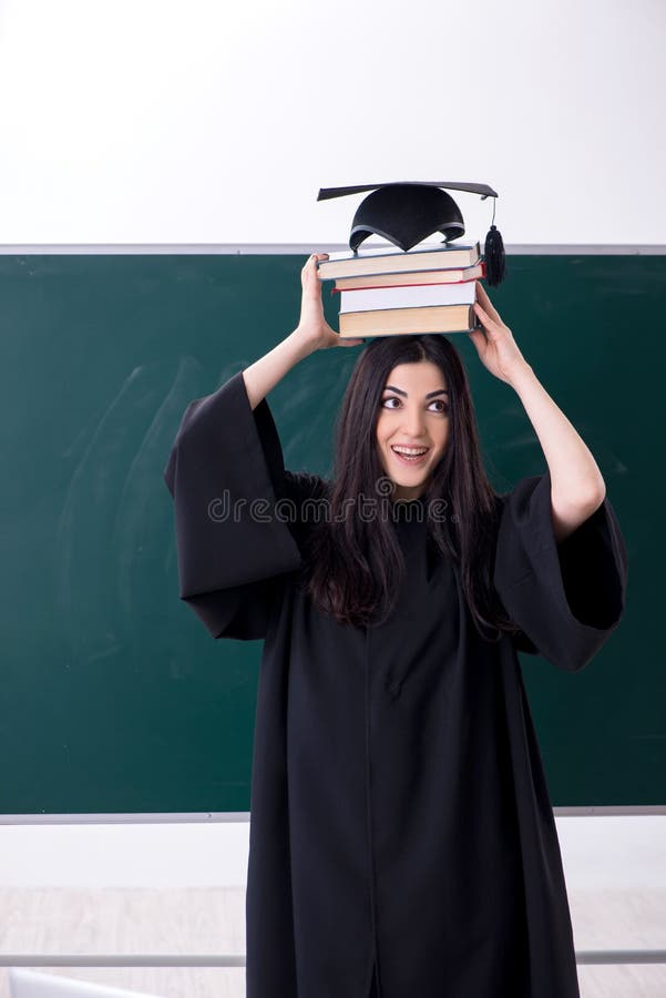 The Female Graduate Student in Front of Green Board Stock Photo - Image ...
