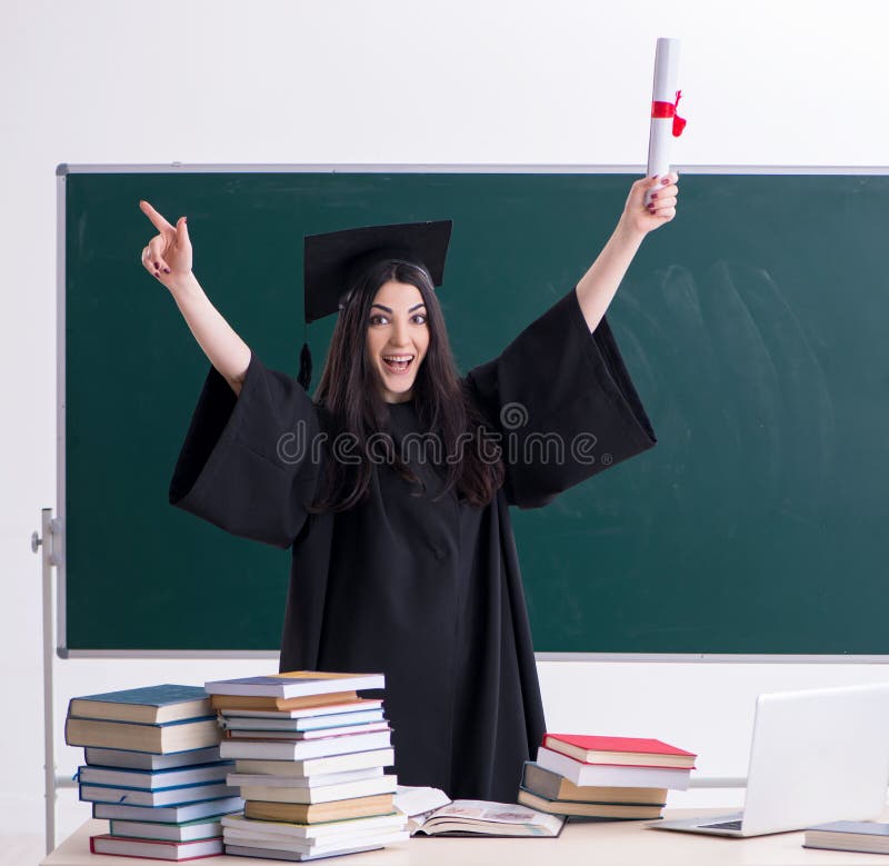 Female Graduate Student in Front of Green Board Stock Photo - Image of ...