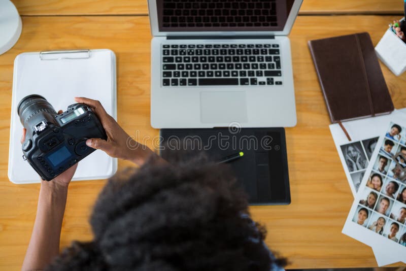 Female Graphic Designer Using Digital Camera Stock Photo - Image of ...