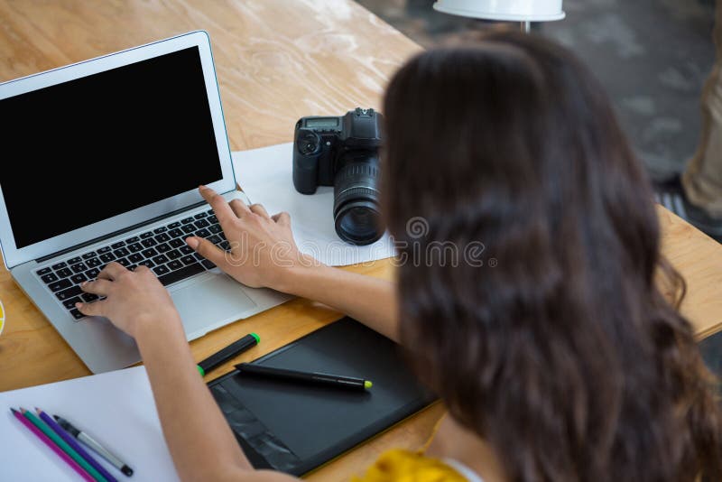Female Graphic Designer Using Laptop Stock Image - Image of artist ...