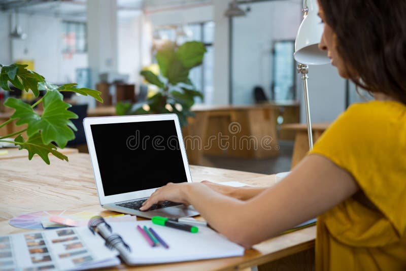 Female Graphic Designer Using Laptop Stock Photo - Image of handsome ...